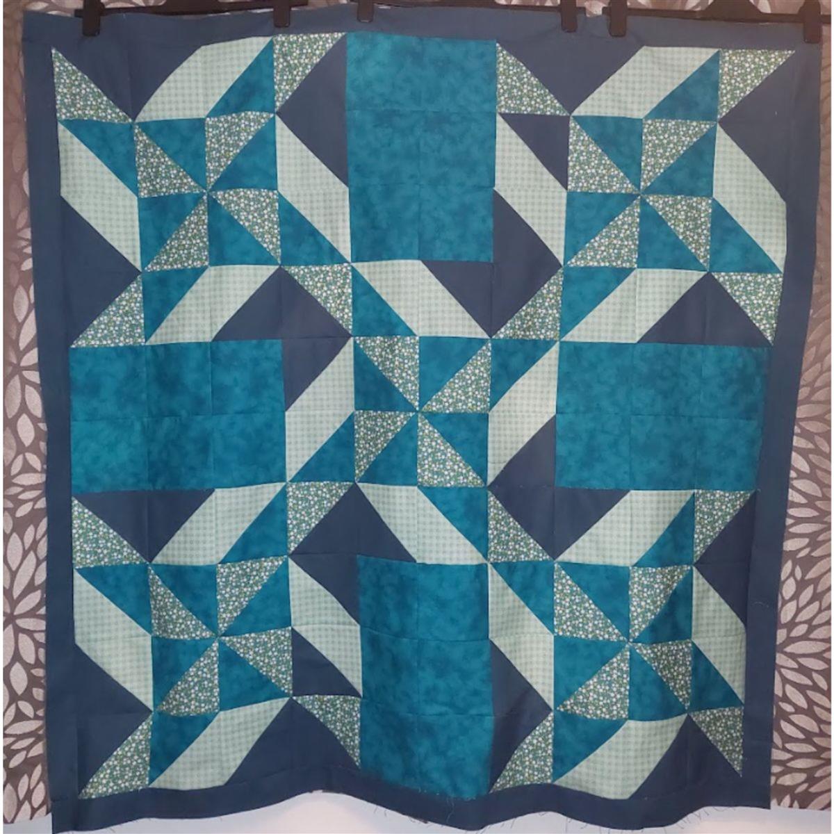 Suzie Duncan's Pin Wheel Quilt Instructions | SewingStreet